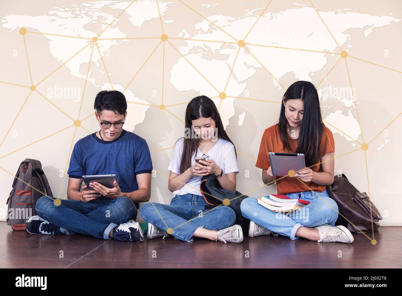 Man and girls friend classmates sitting useing with technology at ...