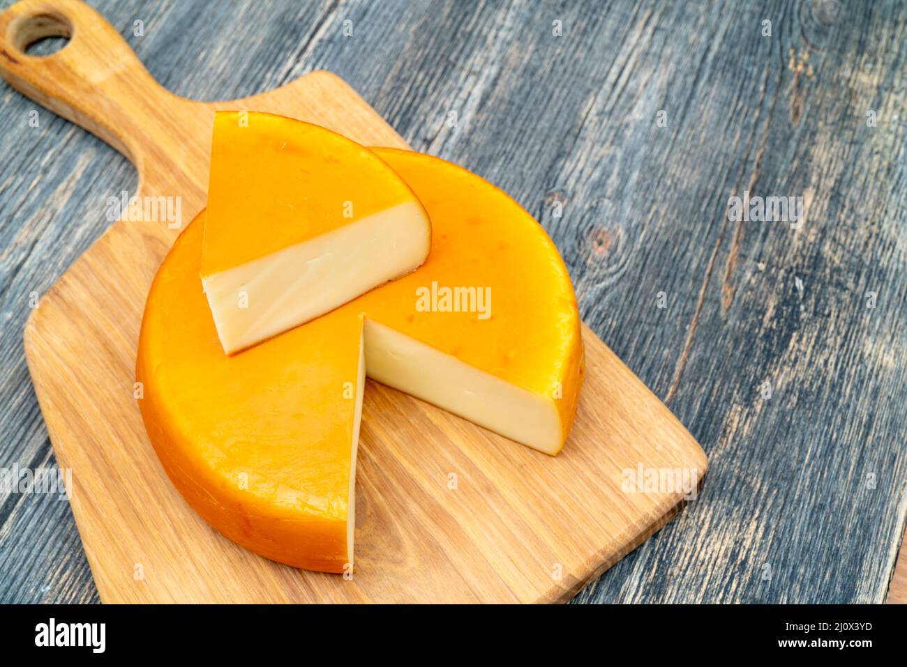 Fresh, round cheese Stock Photo - Alamy
