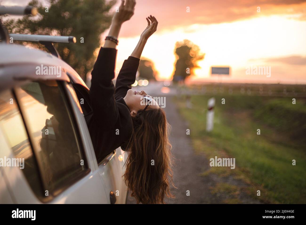 Sunset through car window hi-res stock photography and images - Alamy