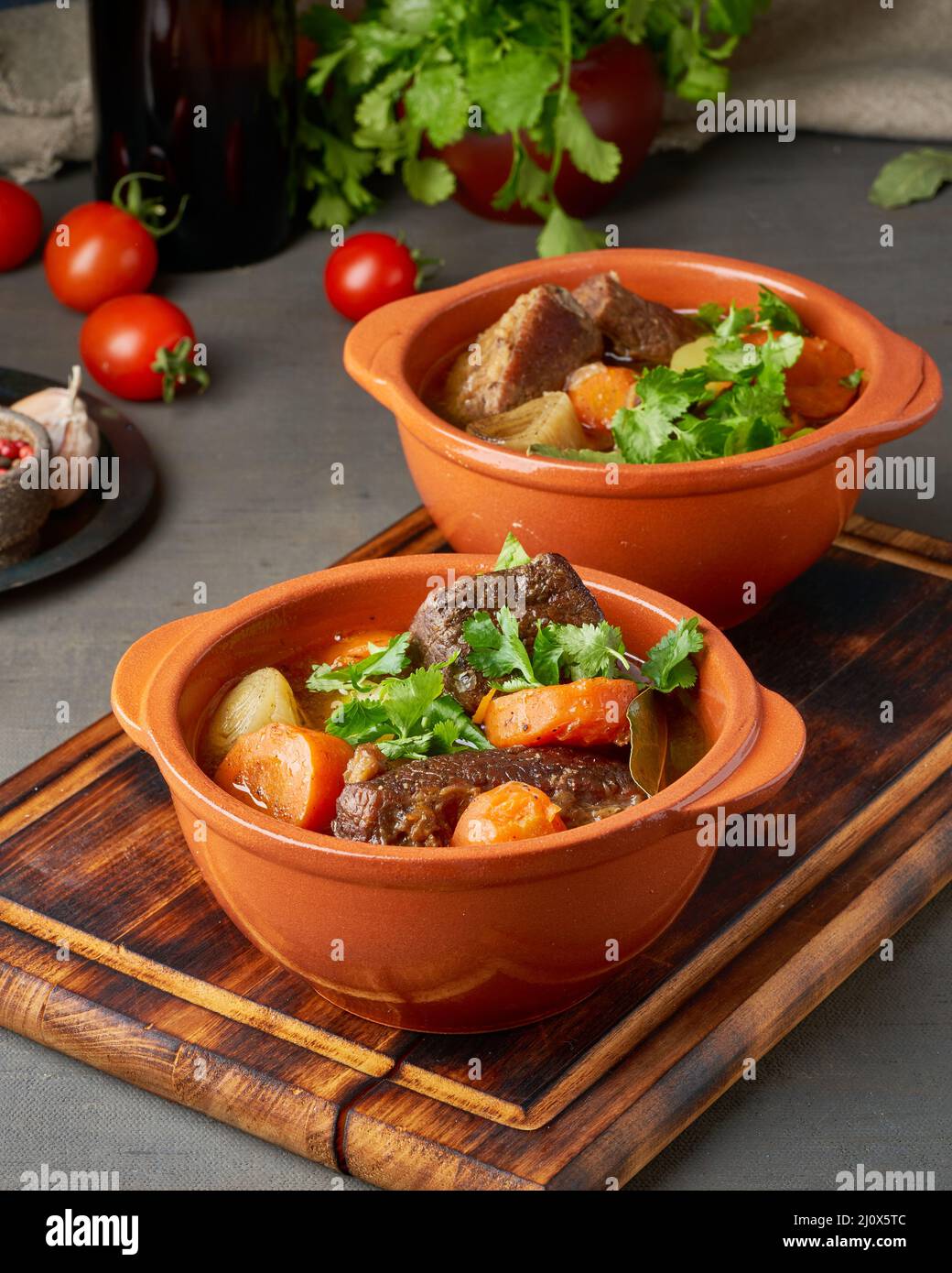 Burgundy meat. Slow stewing, cooking in two pot or cast-iron pan Stock ...