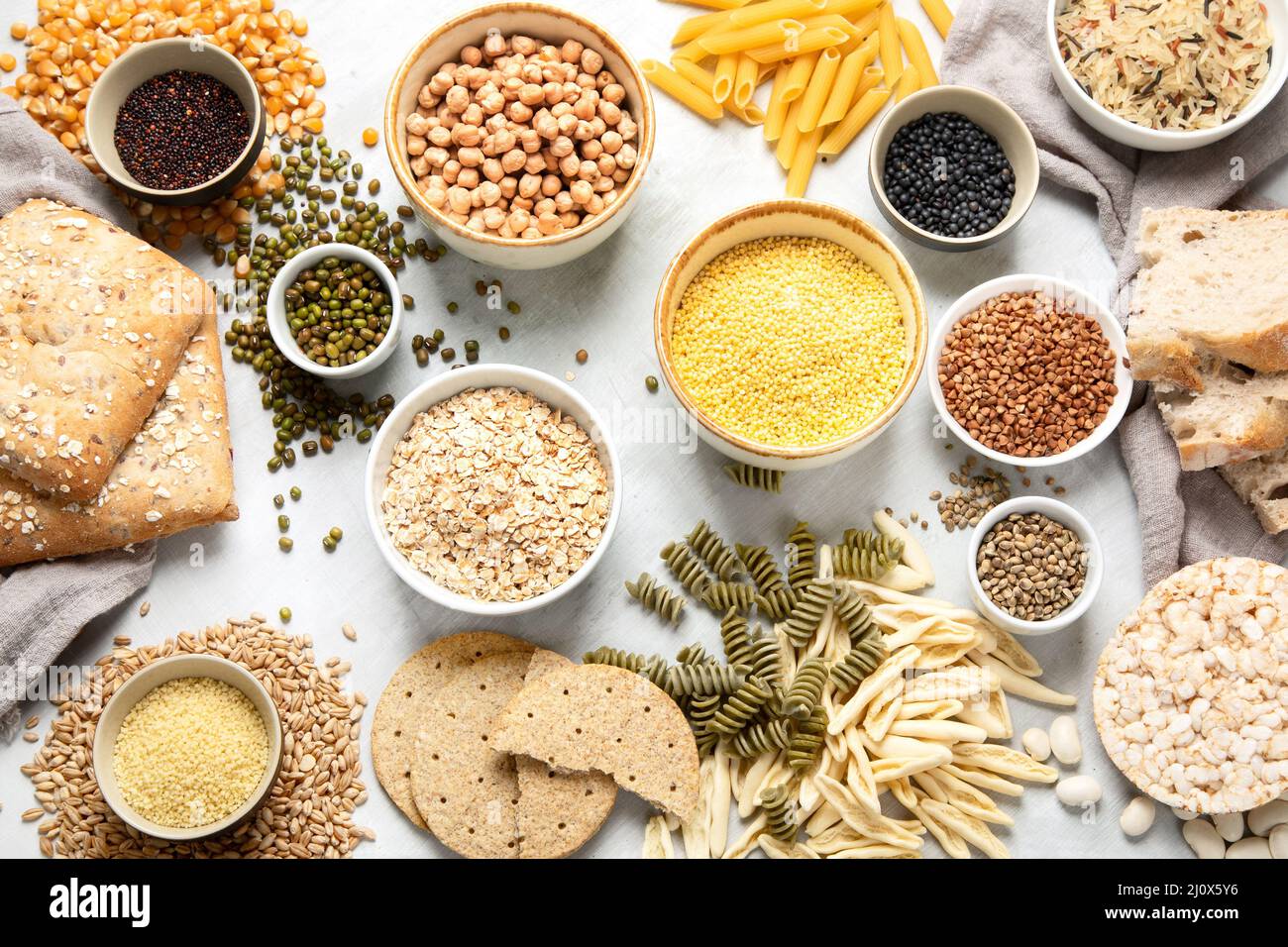 Best sources of carbs on light gray background. Healthy food concept ...