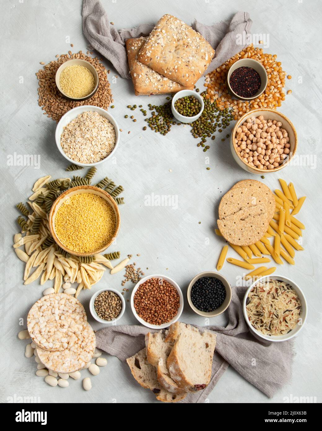 Best sources of carbs on light gray background. Healthy food concept ...