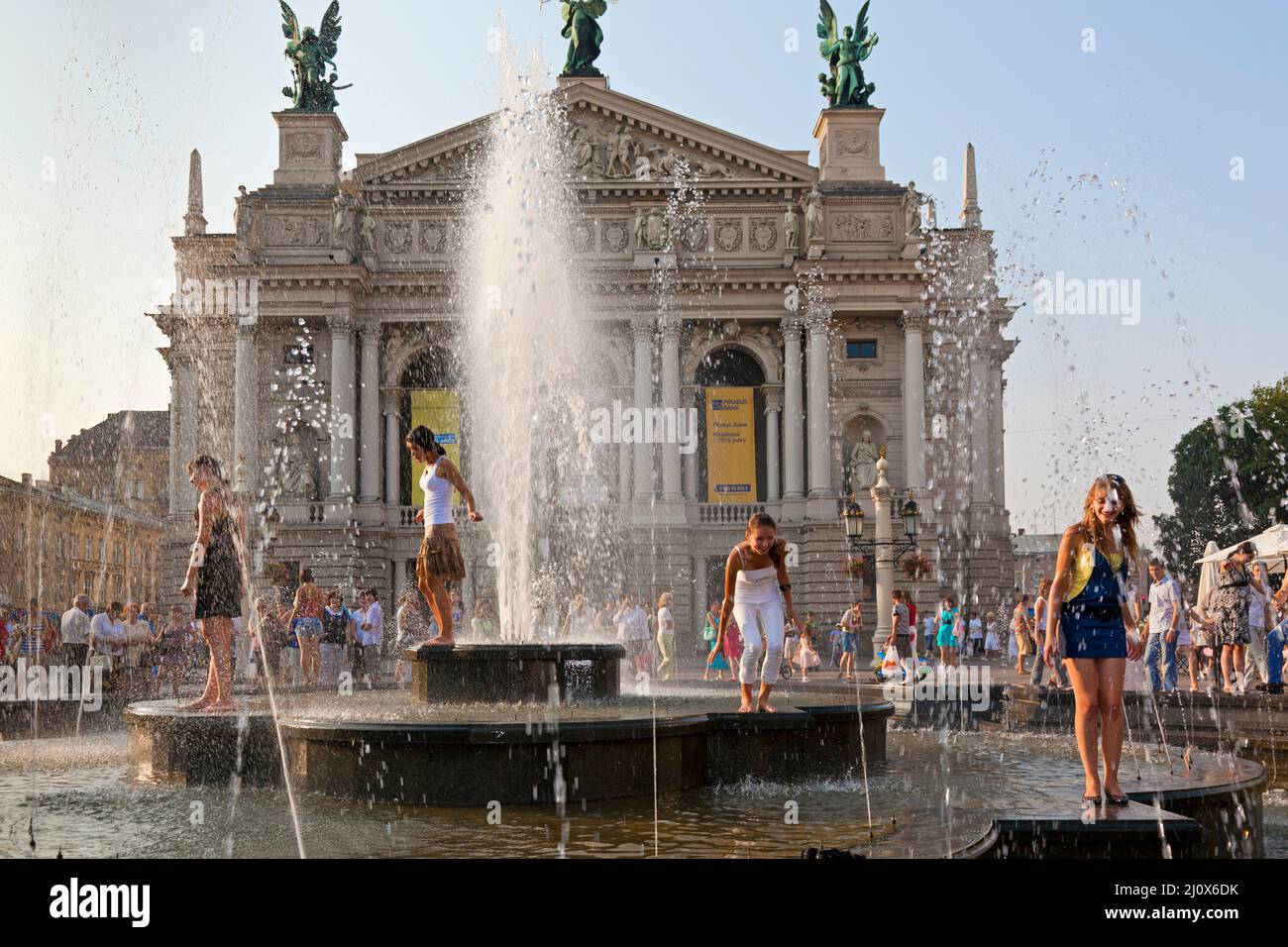 People playing in the fountain, L'viv, Ukraine Stock Photo - Alamy