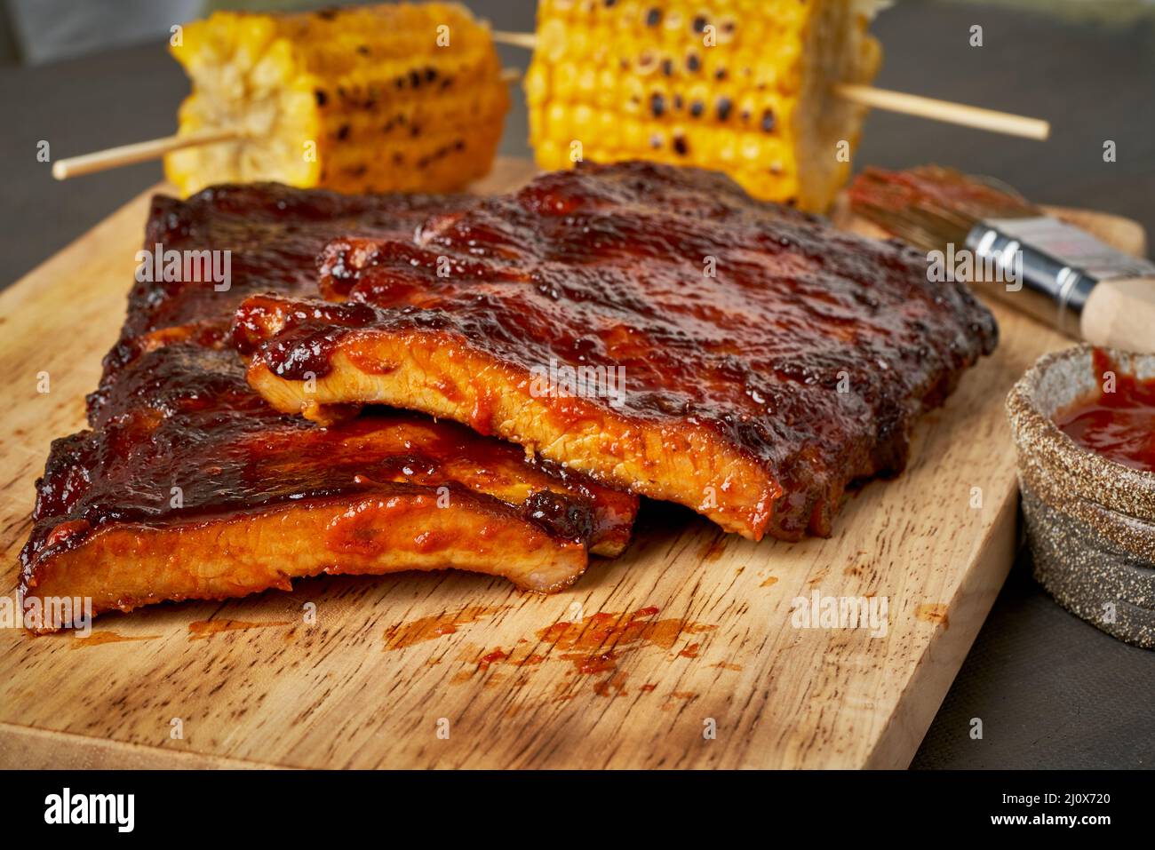 Barbecue pork ribs. Slow cooking recipe. Whole pickled roasted pork ...