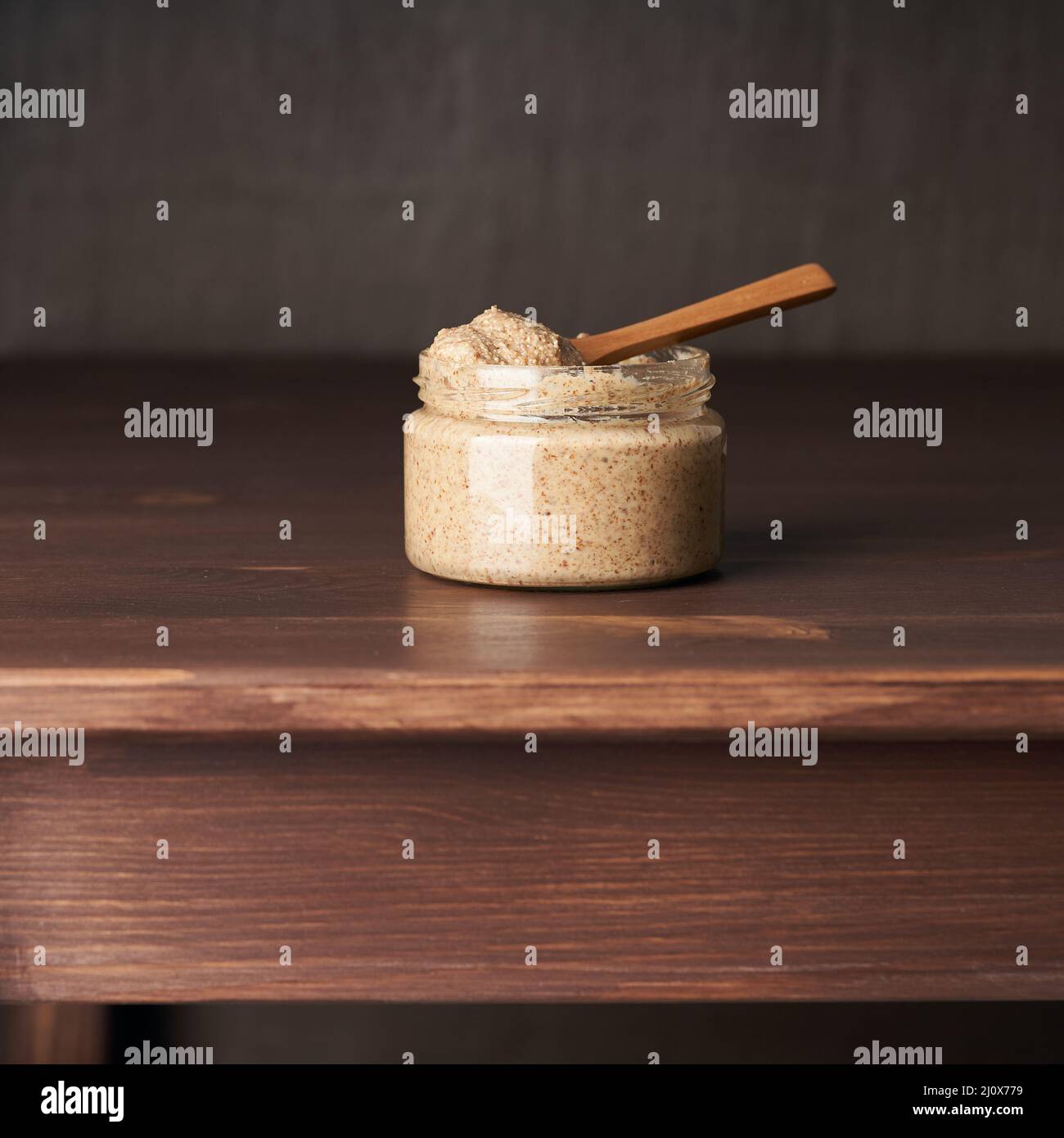 Almond butter, raw food paste made from grinding almonds into nut ...