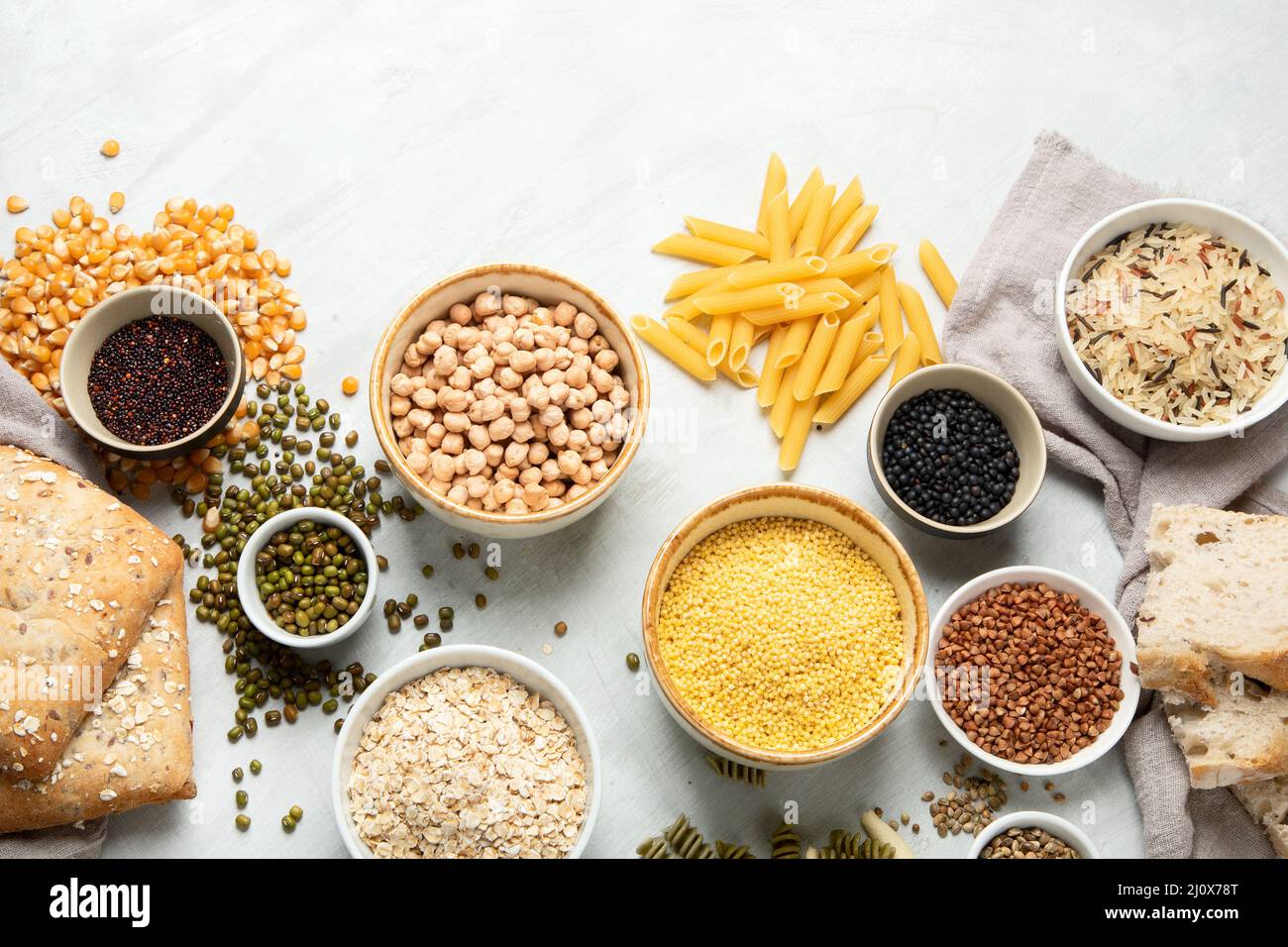 Best sources of carbs on light gray background. Healthy food concept ...