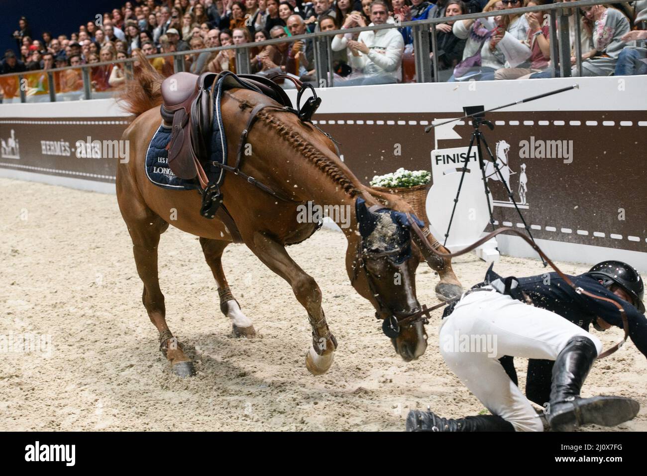 Bryan Balsiger and Twentytwo Des Biches compete during the Saut Hermes ...