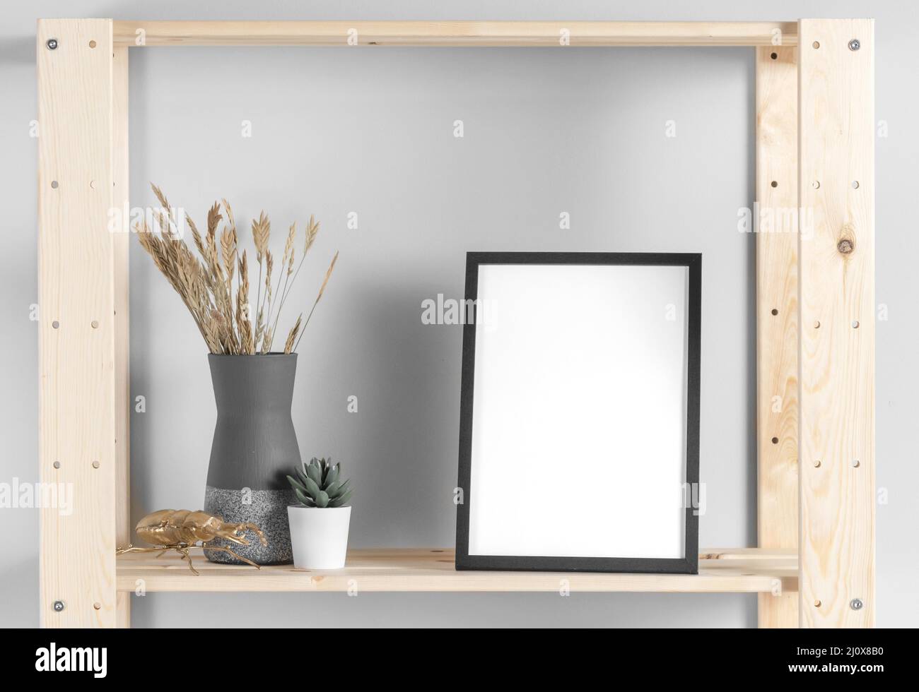 Mock up frames shelf Stock Photo - Alamy