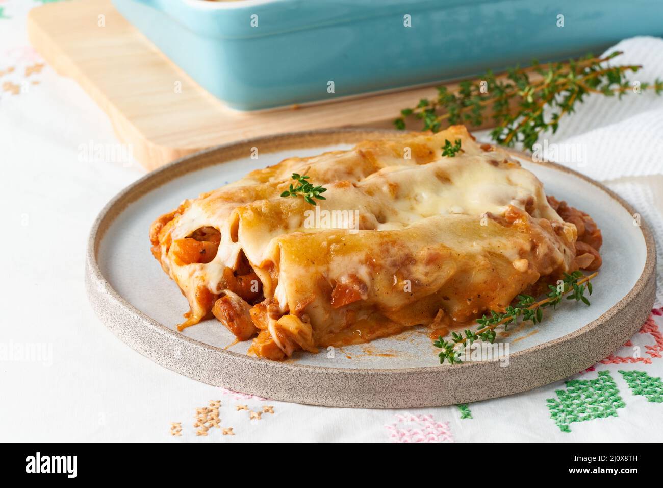 Cannelloni pasta with filling of ground beef, tomatoes, baked with ...