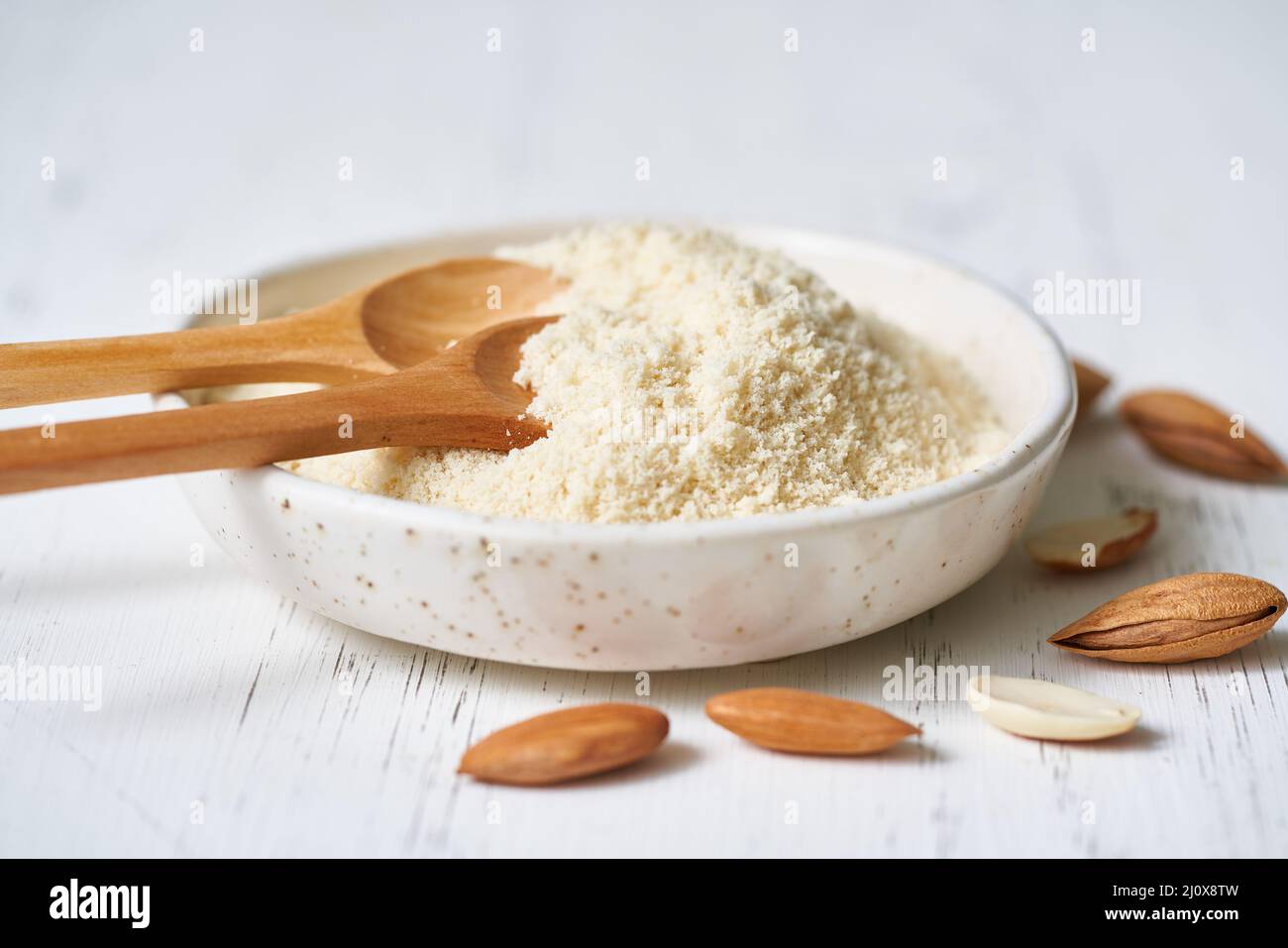 Alternative almond flour. White background, side view, close up Stock ...