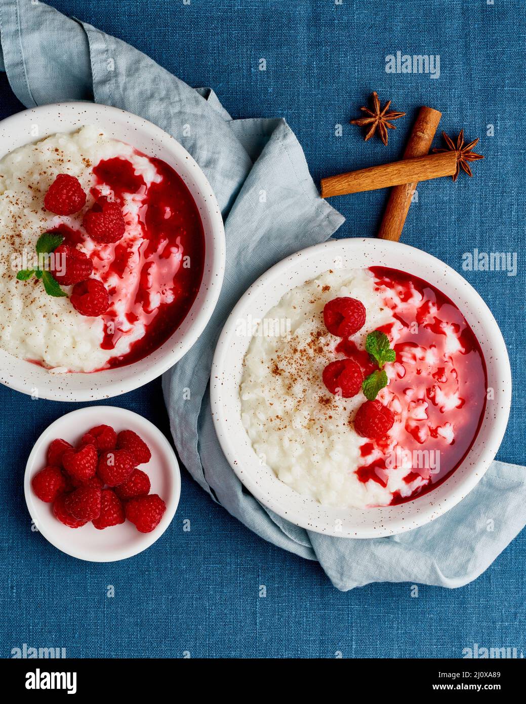 Two rice pudding. French milk rice dessert with raspberries ...