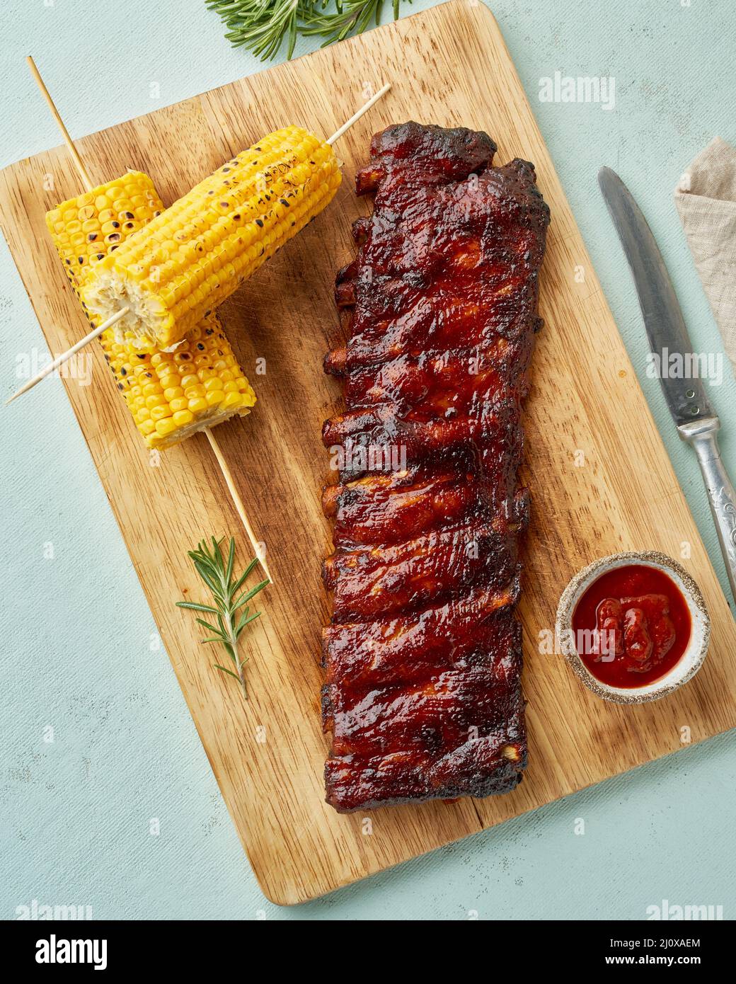 Barbecue pork ribs. Slow cooking recipe. Whole pickled roasted pork ...