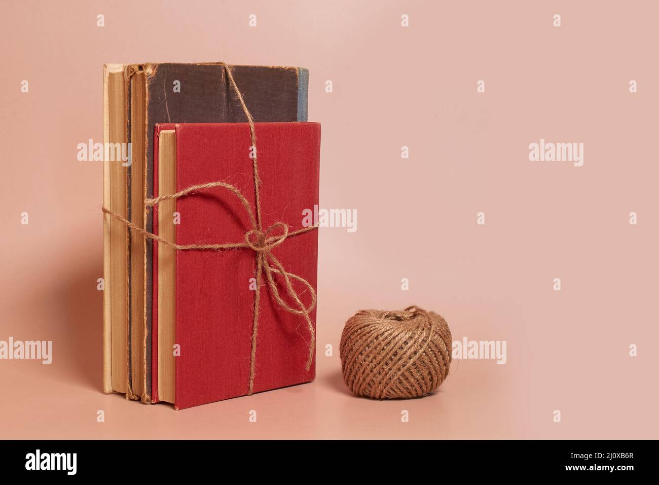 Books tied with a rope hi-res stock photography and images - Alamy