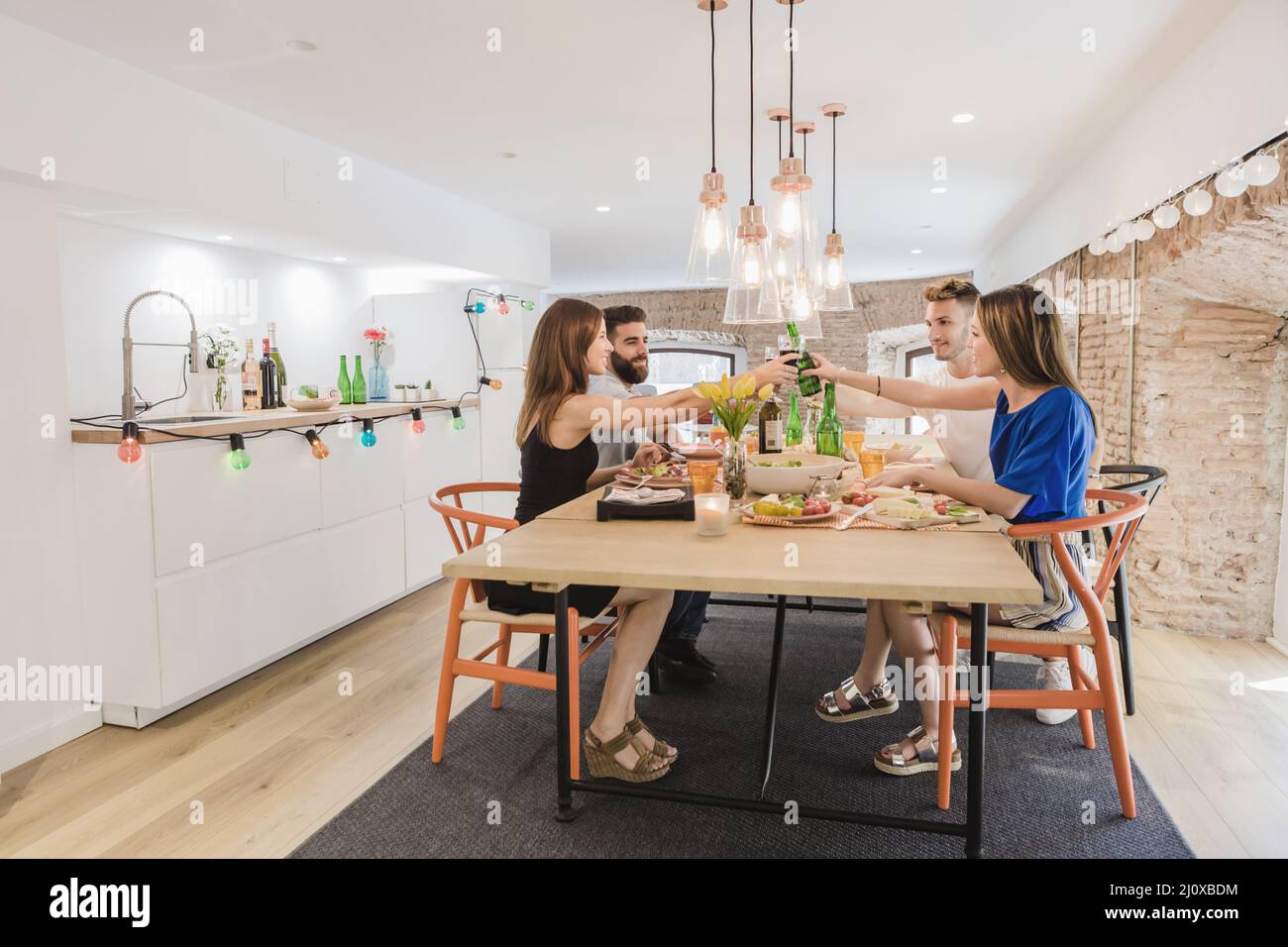 Friends having dinner party Stock Photo - Alamy