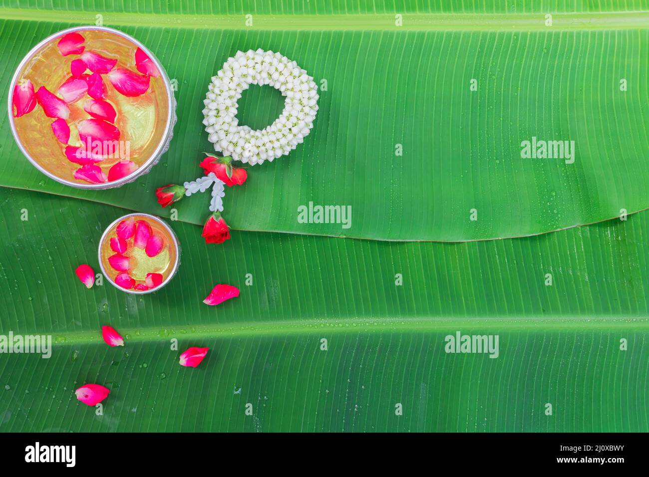 Songkran Festival background with jasmine garland Flowers in a bowl of ...