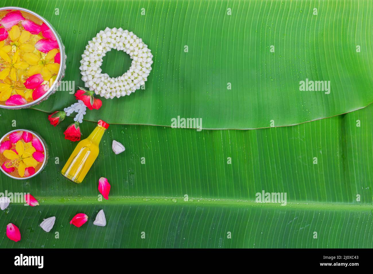 Songkran Festival background with jasmine garland Flowers in a bowl of ...