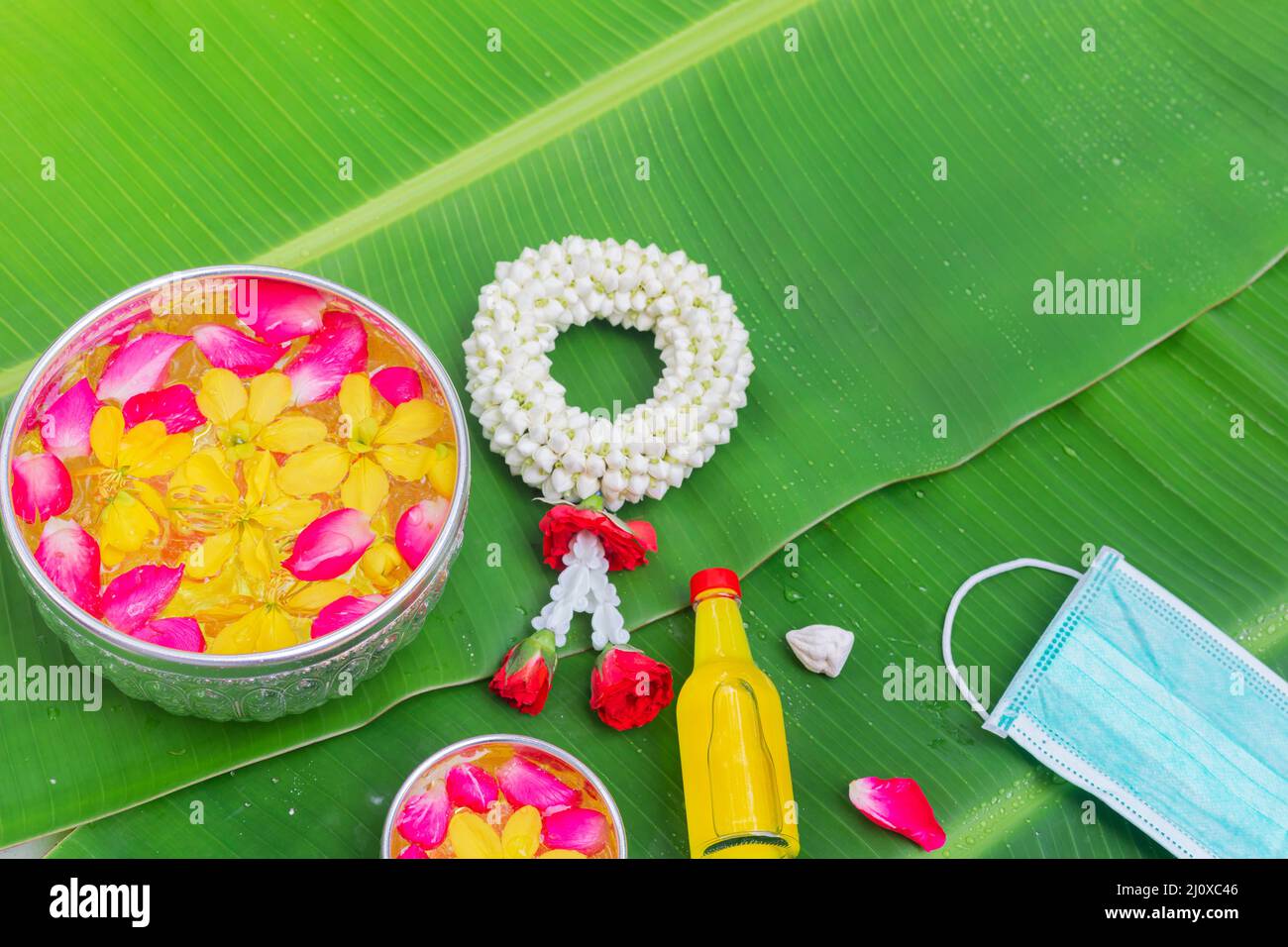 Songkran Festival background with jasmine garland Flowers in a bowl of ...