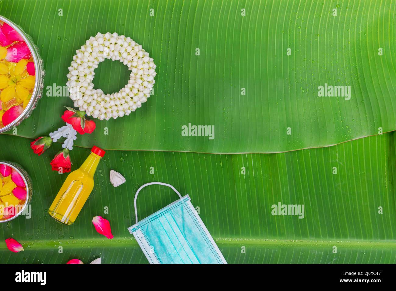 Songkran Festival background with jasmine garland Flowers in a bowl of ...