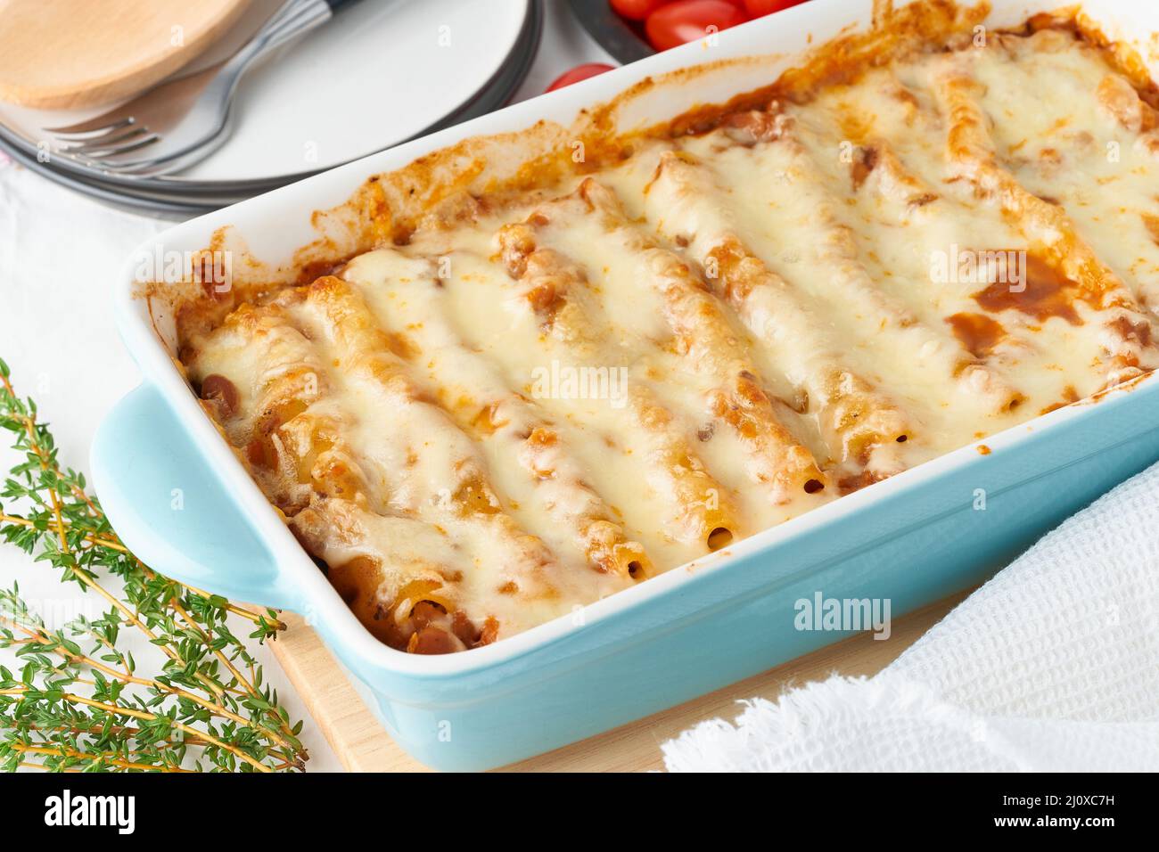 Cannelloni pasta with filling of ground beef, tomatoes, baked with ...