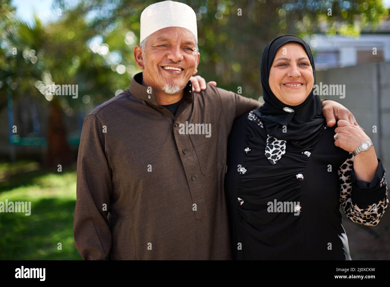 Living life with love. Portrait of a smiling senior muslim couple ...