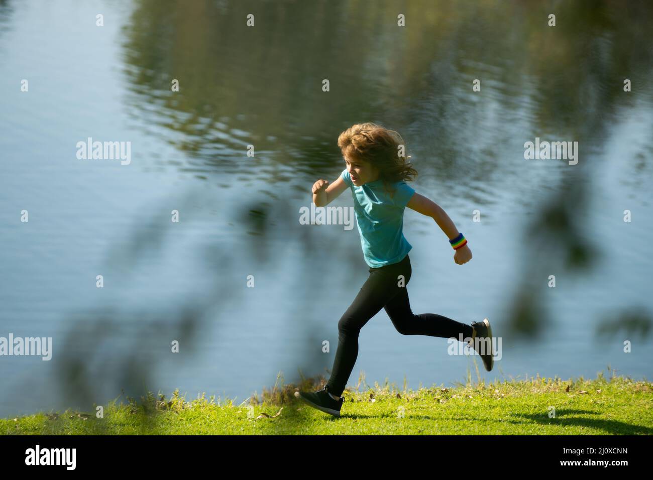 Kids jogging in park outdoor. Healthy sport activity for children ...