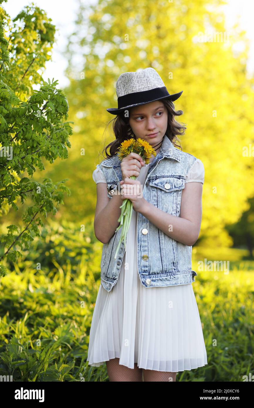 Girl in the park in the evening of a sunny day in the spring Stock ...