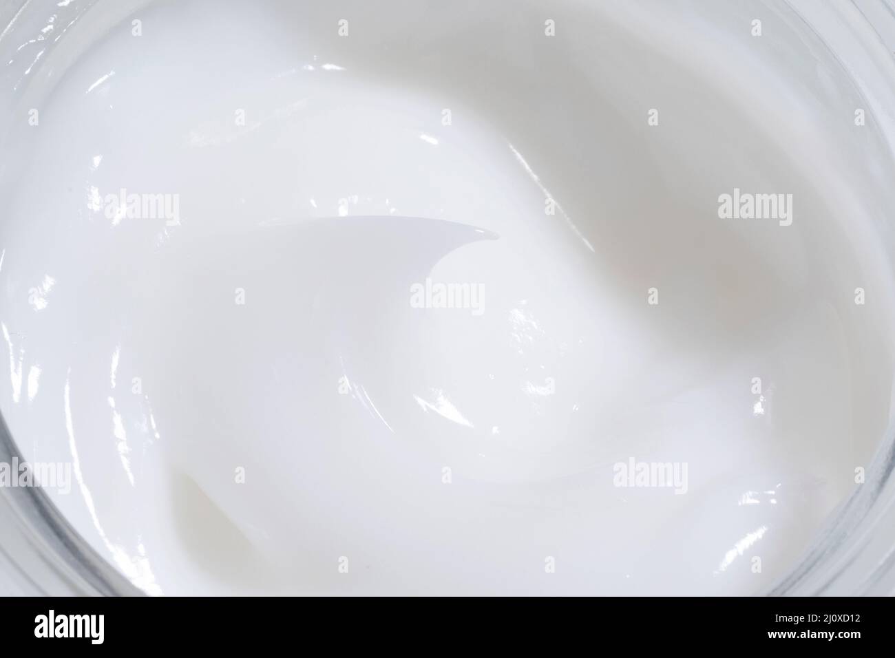 isolated smear beauty cosmetics texture of white face cream, white ...