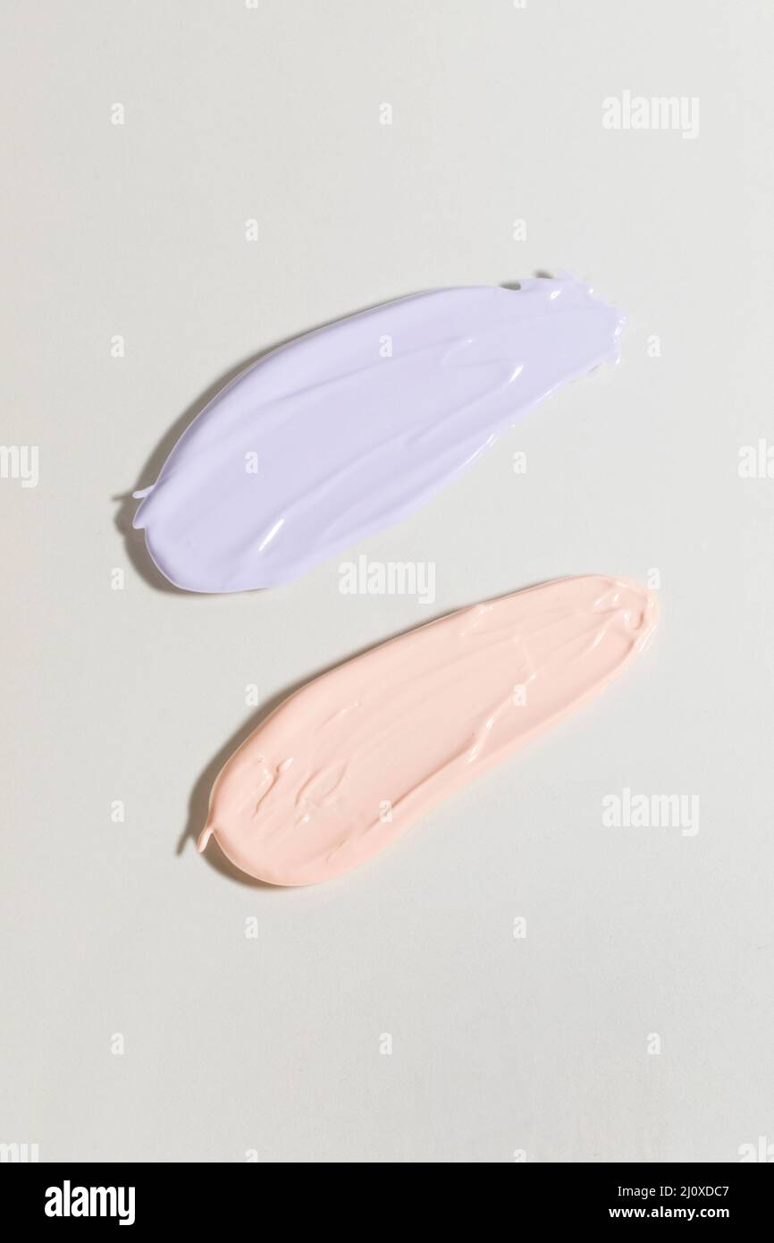 isolated smear beauty cosmetics texture of makeup base, white ...