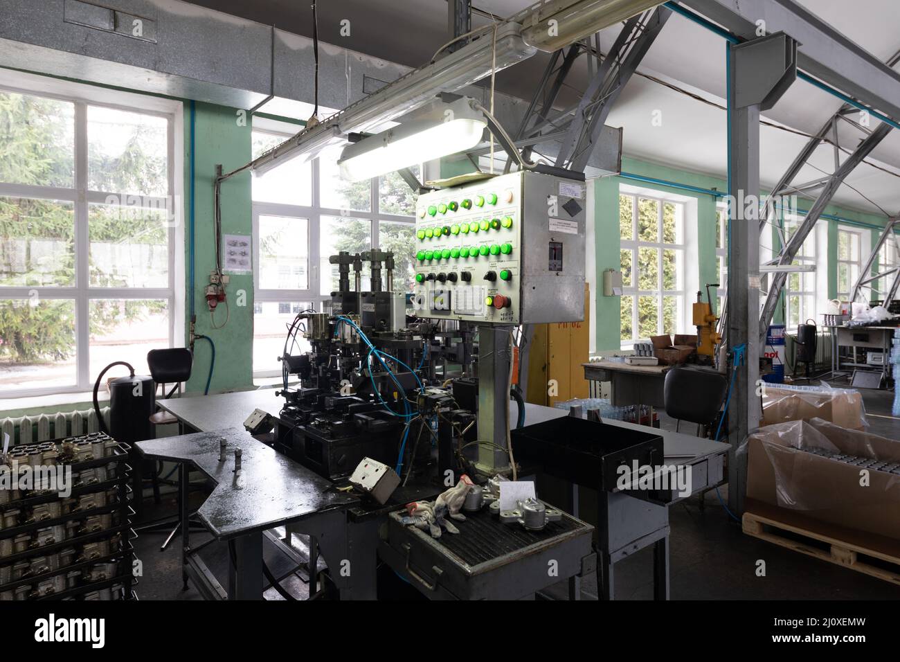 Photo of automobile assembly production. Factory with steel ...