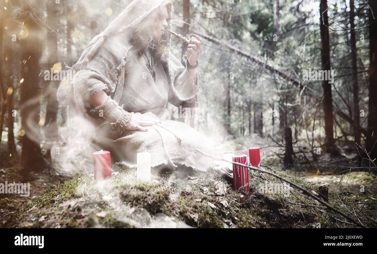 Fairy magician. A sorcerer with a glass sphere, a magical spell and a ...