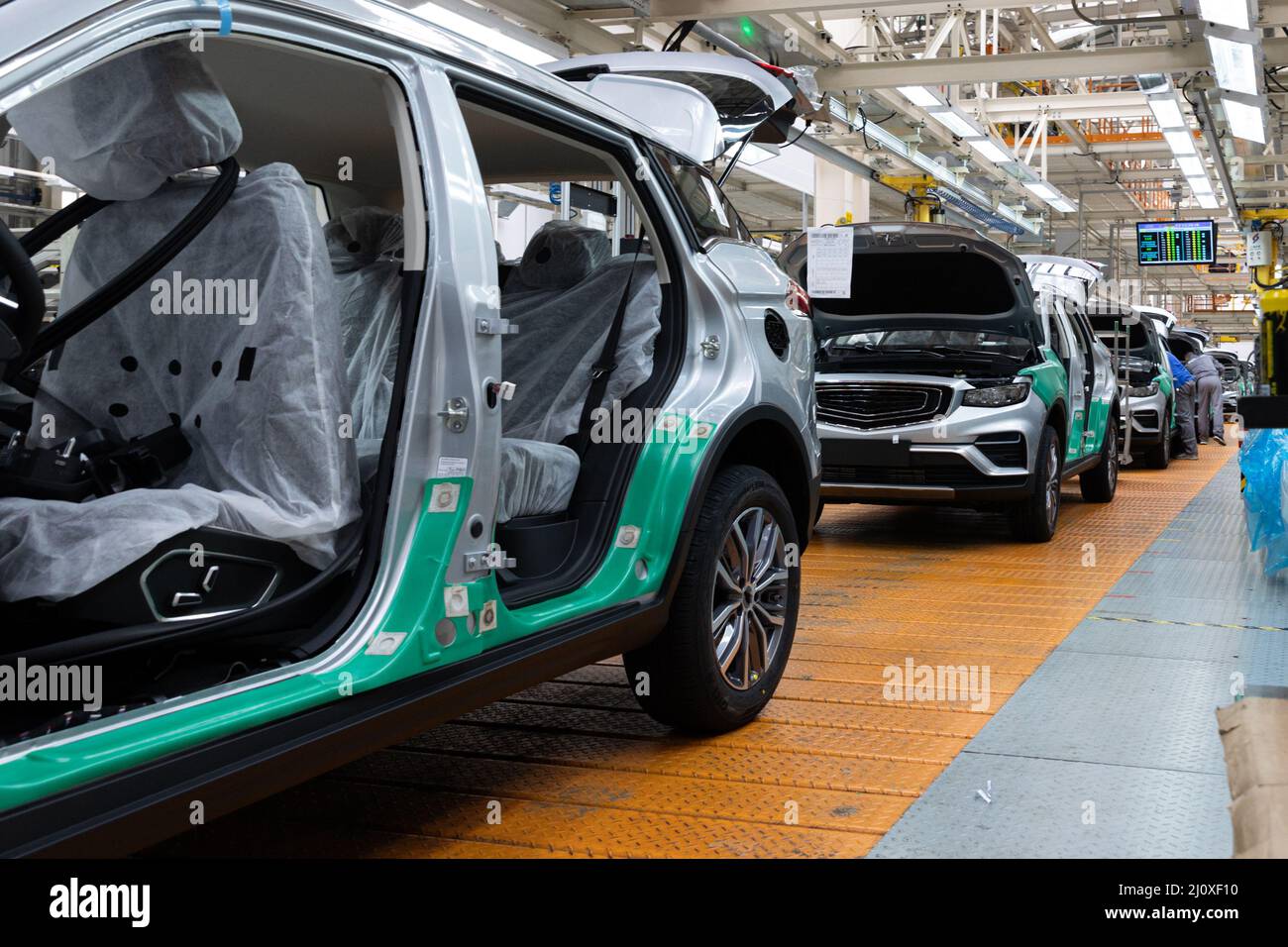 Photo of automobile production line. Welding car bodies. Modern car ...