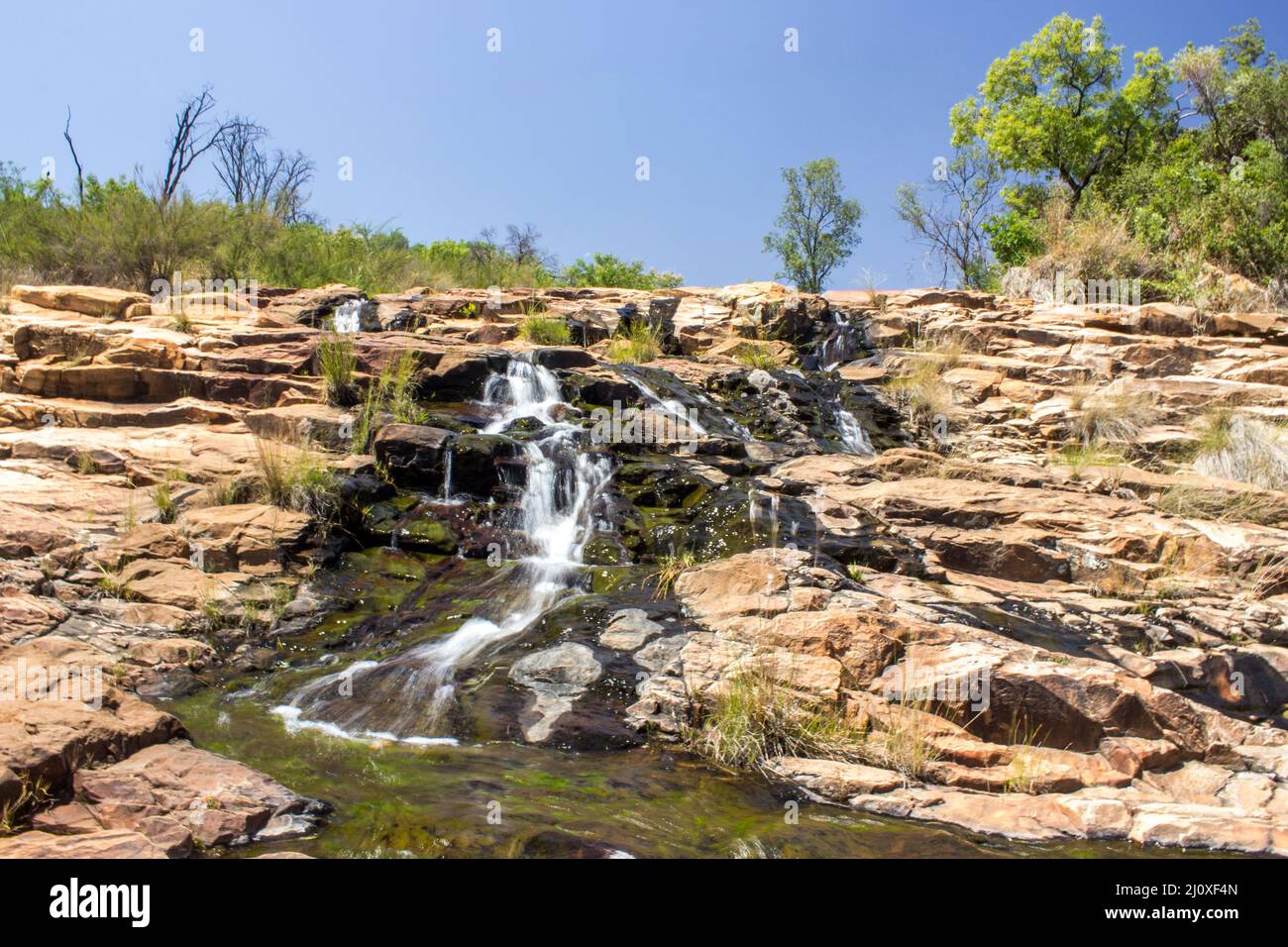 Water flowing into a rock hi-res stock photography and images - Alamy