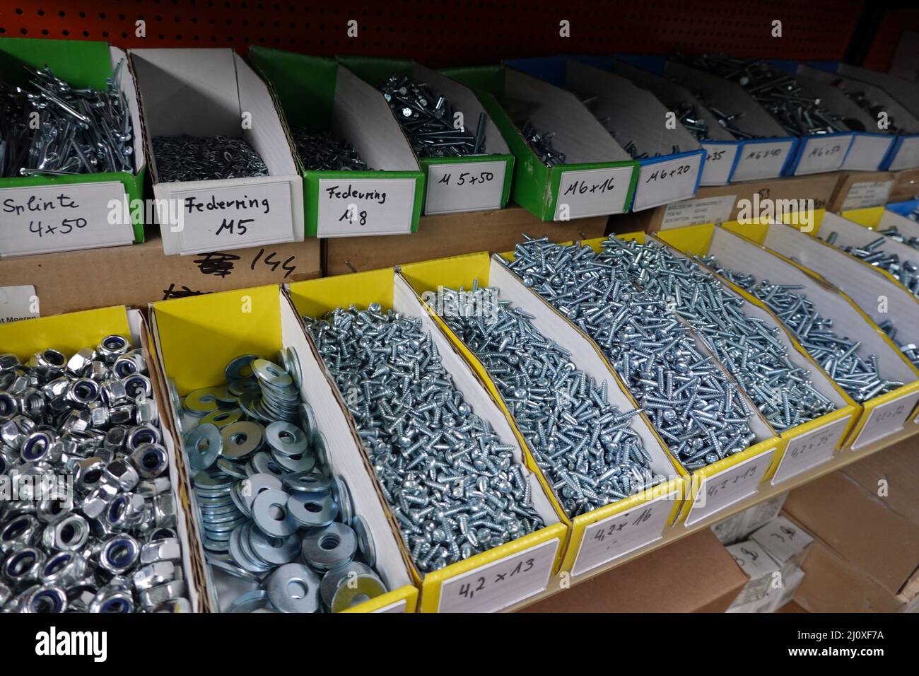 Various screws and nails as loose goods in a remnant market Stock Photo ...