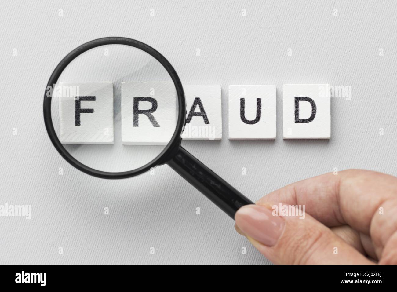 Fraud word magnifying glass. High quality beautiful photo concept Stock ...