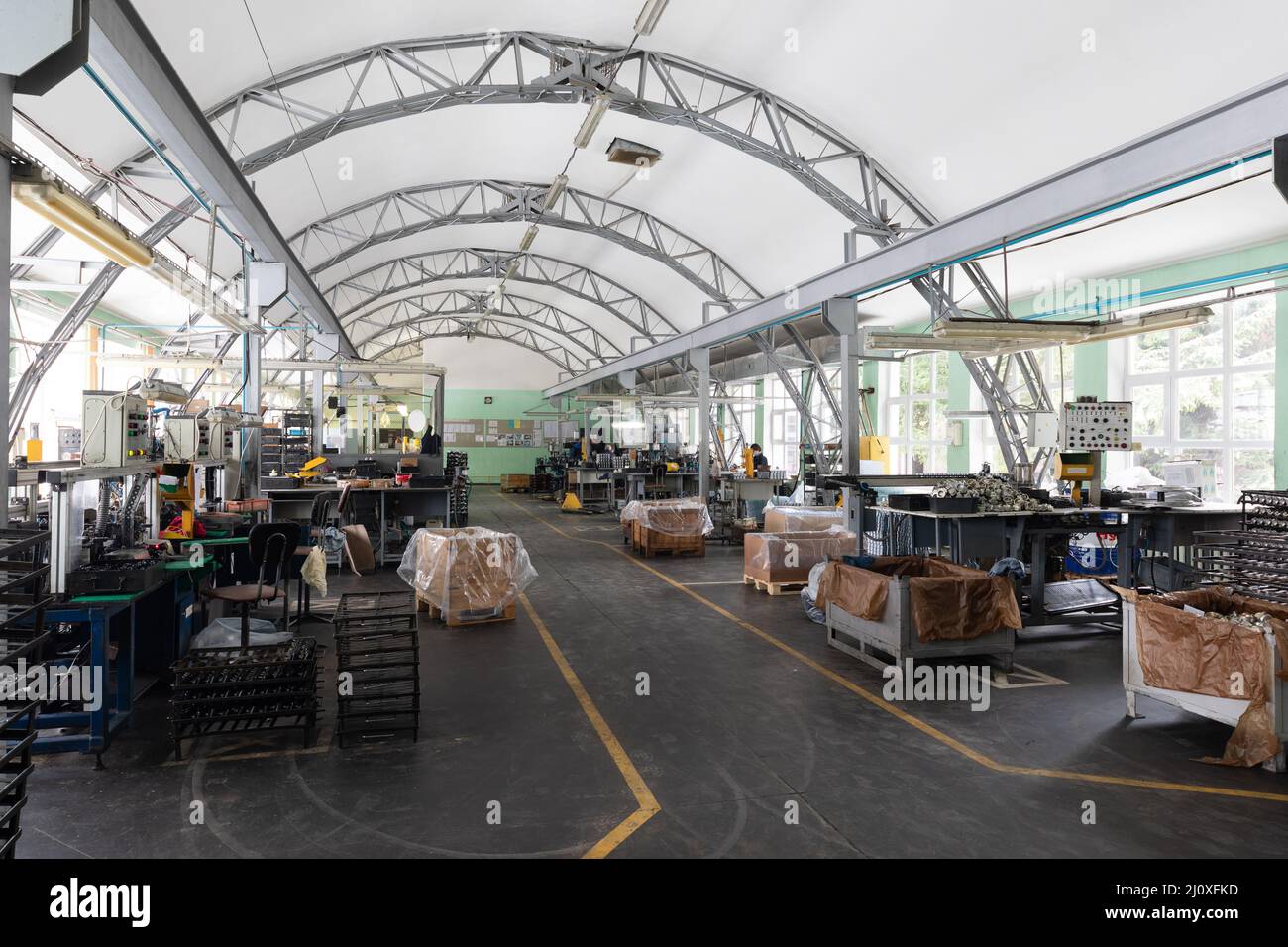 Automobile assembly production. Factory with steel constructions. Plant ...