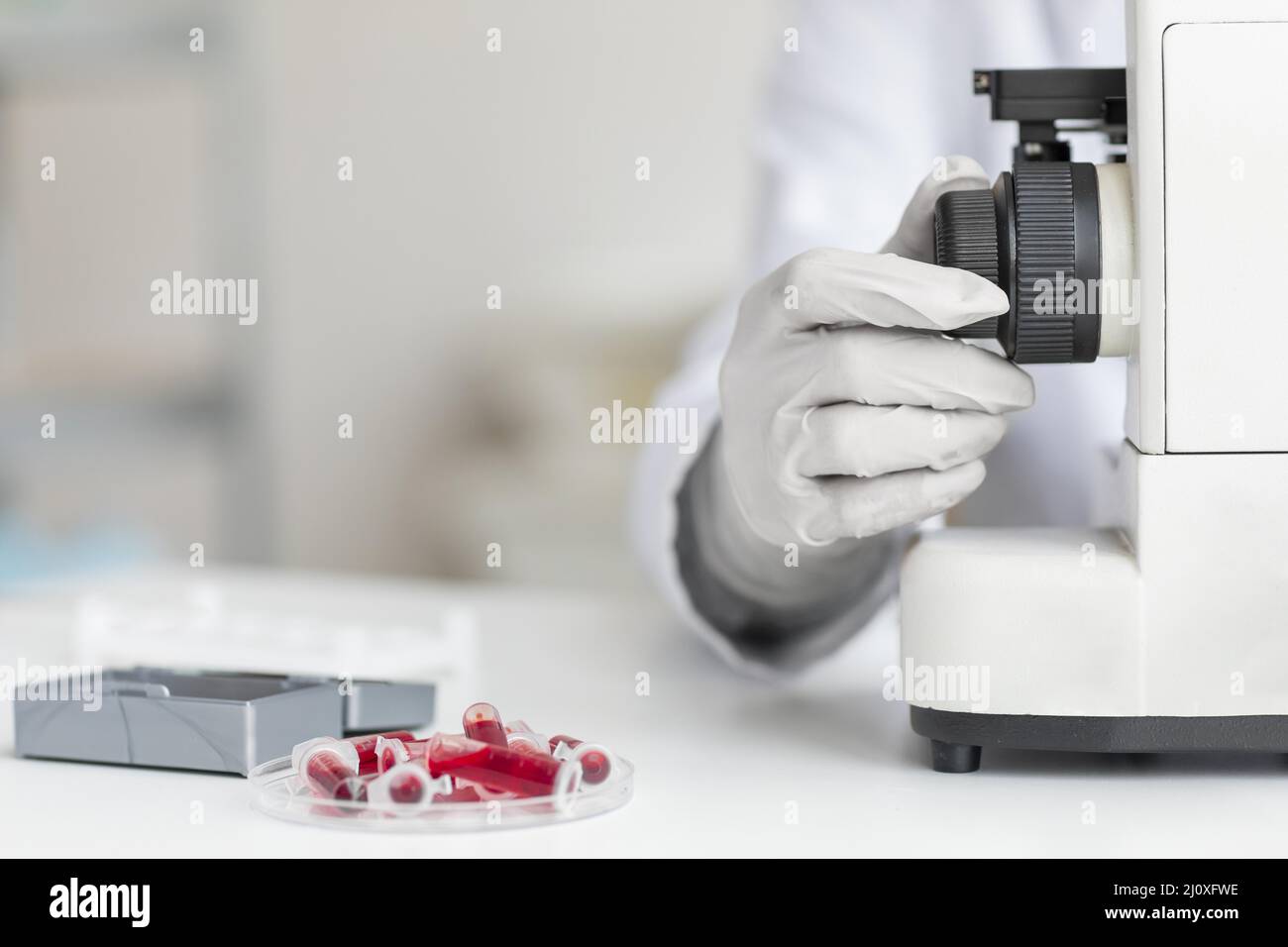 Close up hand using microscope. High quality beautiful photo concept ...