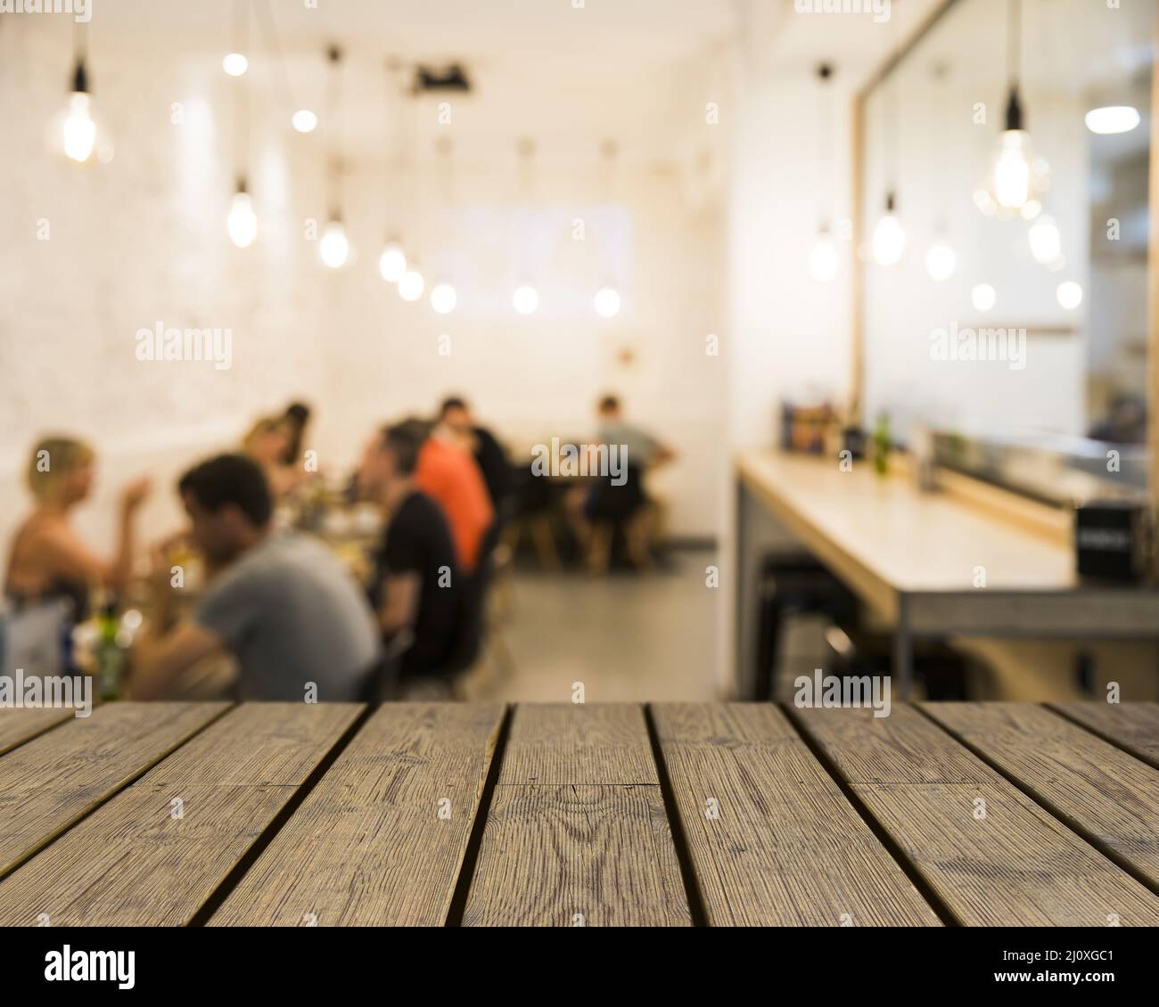 People to table top hi-res stock photography and images - Alamy