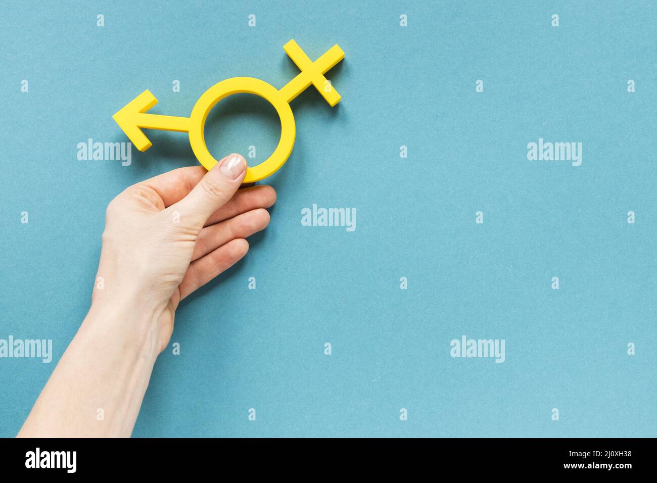 Hand holding colorful equality symbol. High quality photo Stock Photo ...