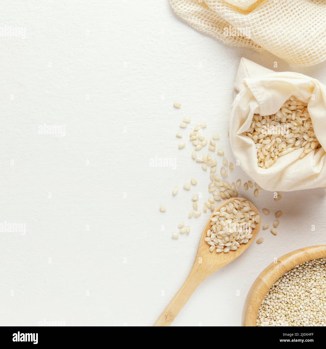 Cloth bag with rice wooden spoon. High quality beautiful photo concept ...