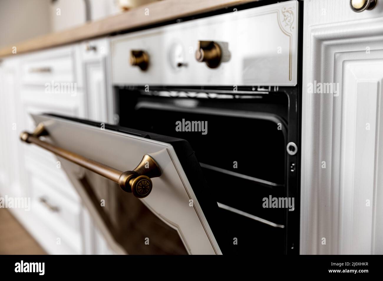 Close up oven with golden details. High quality beautiful photo concept ...