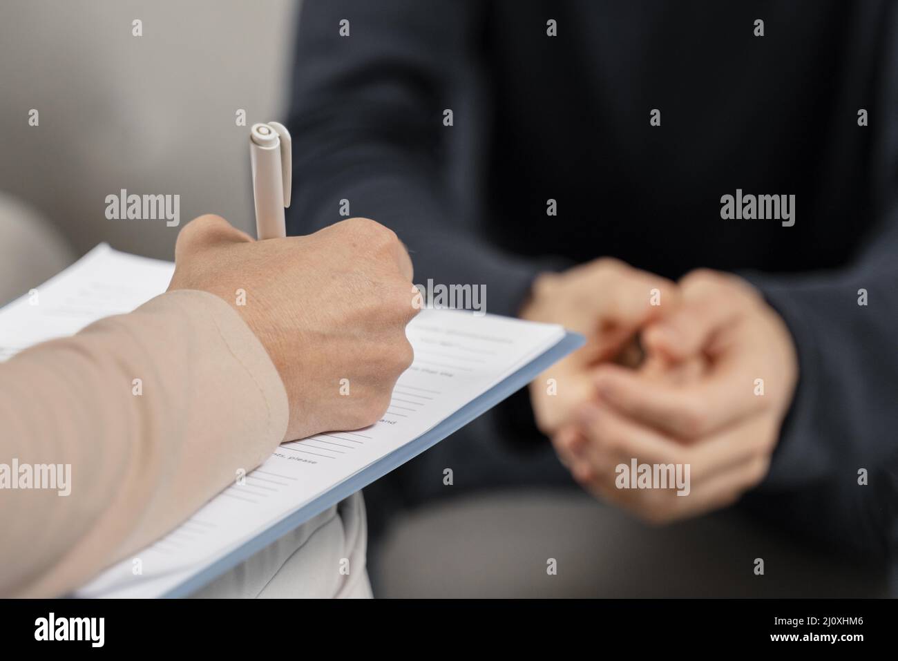 Mid shot woman therapist taking notes clipboard. High quality beautiful ...