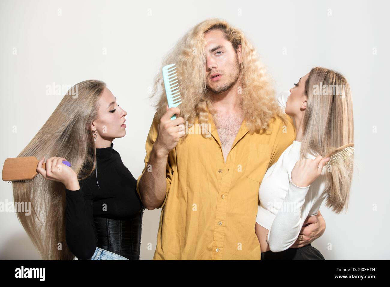 Group young people with healthy long and curly hair with brush ...