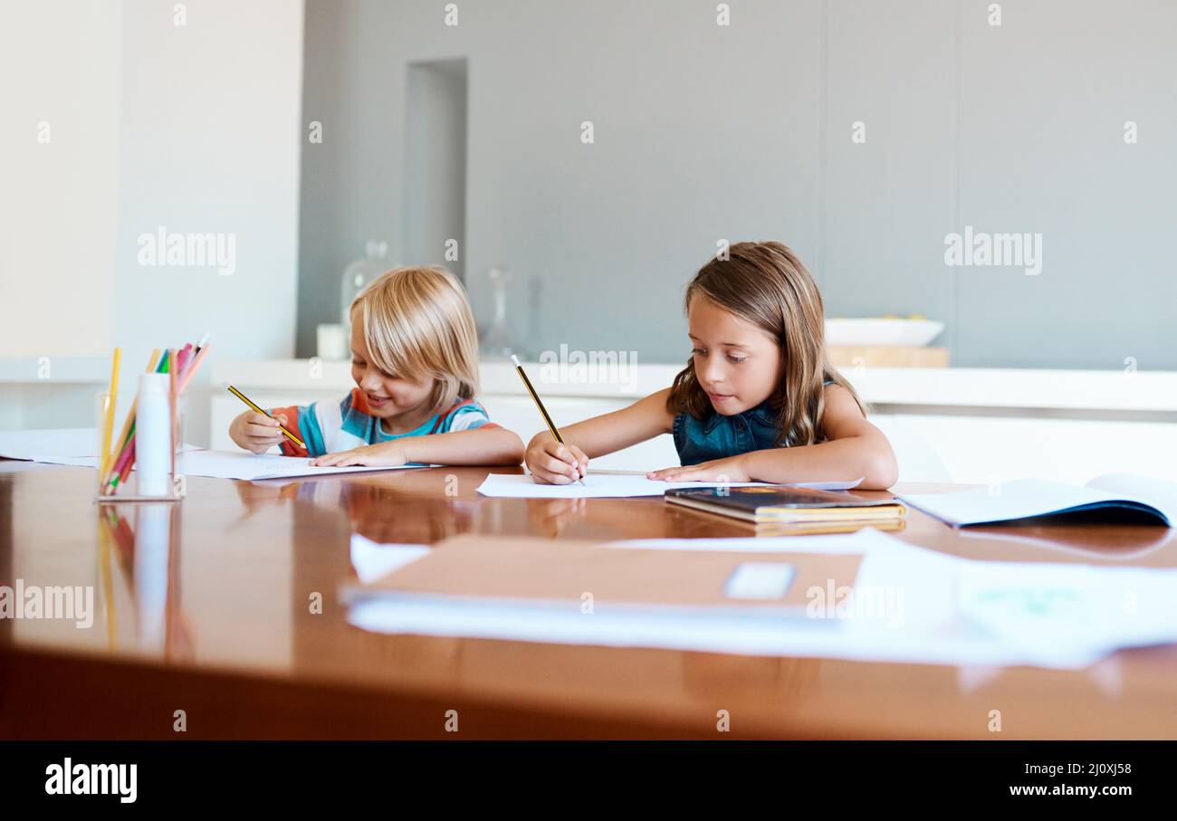 School is cool and they already know it. Shot of two adorable young ...