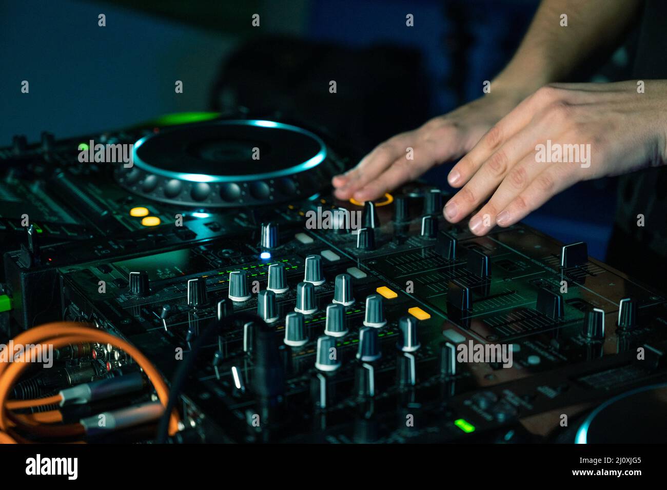 Dj mixing at party festival with light and smoke in background - Summer ...
