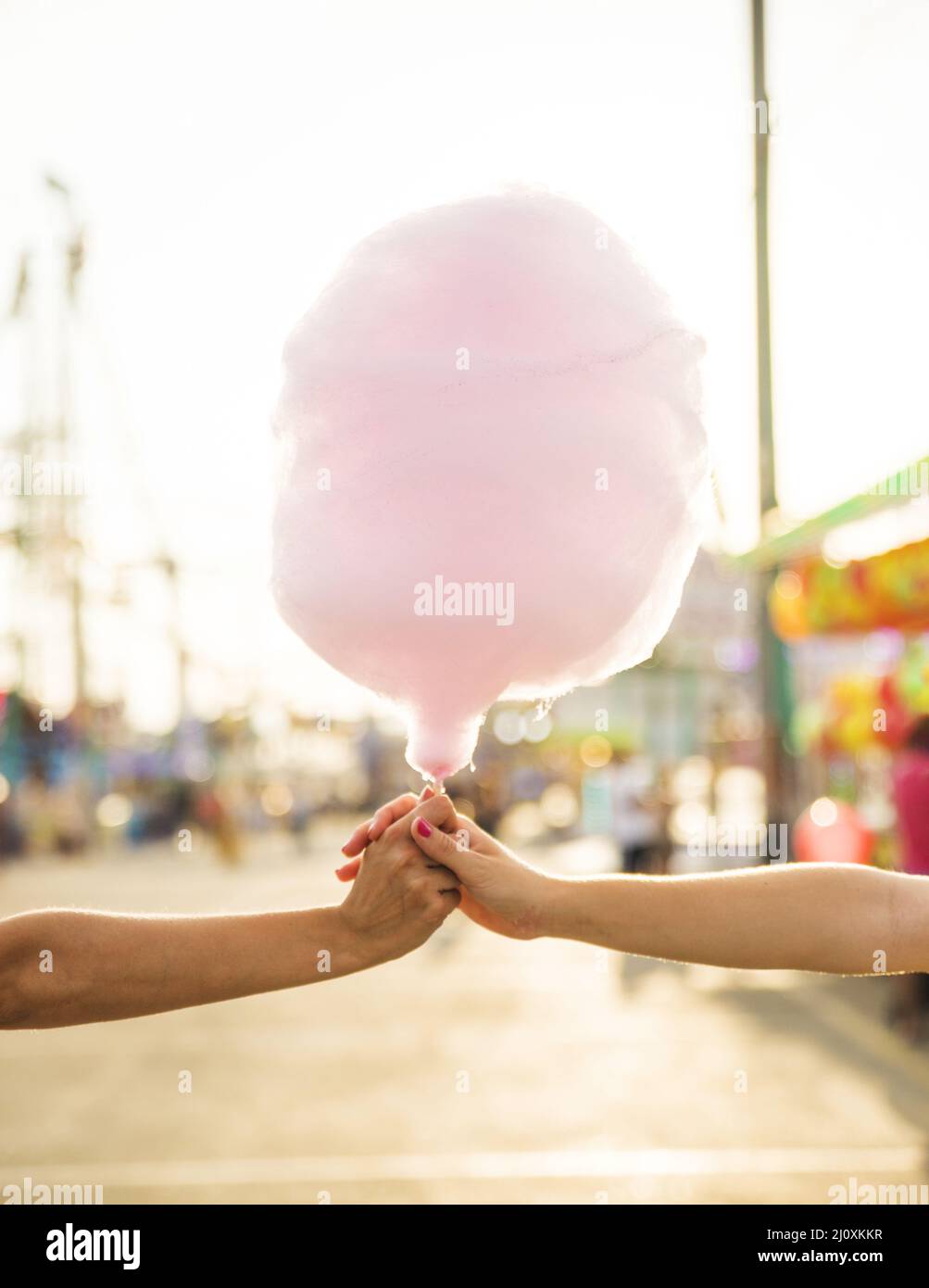 Hand holding candy hi-res stock photography and images - Alamy