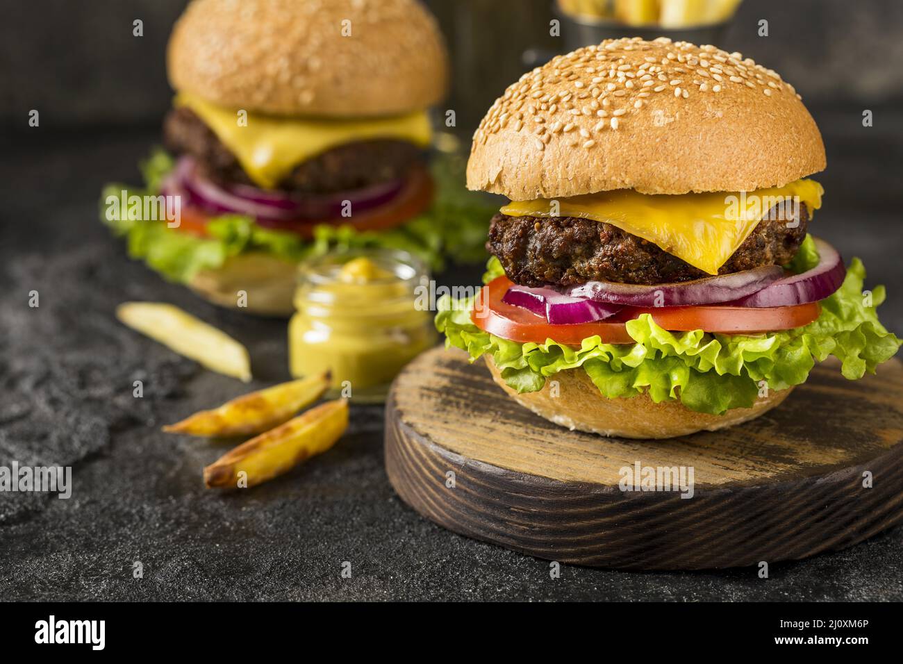 Close up beef burgers cutting board with sauce. High quality beautiful ...