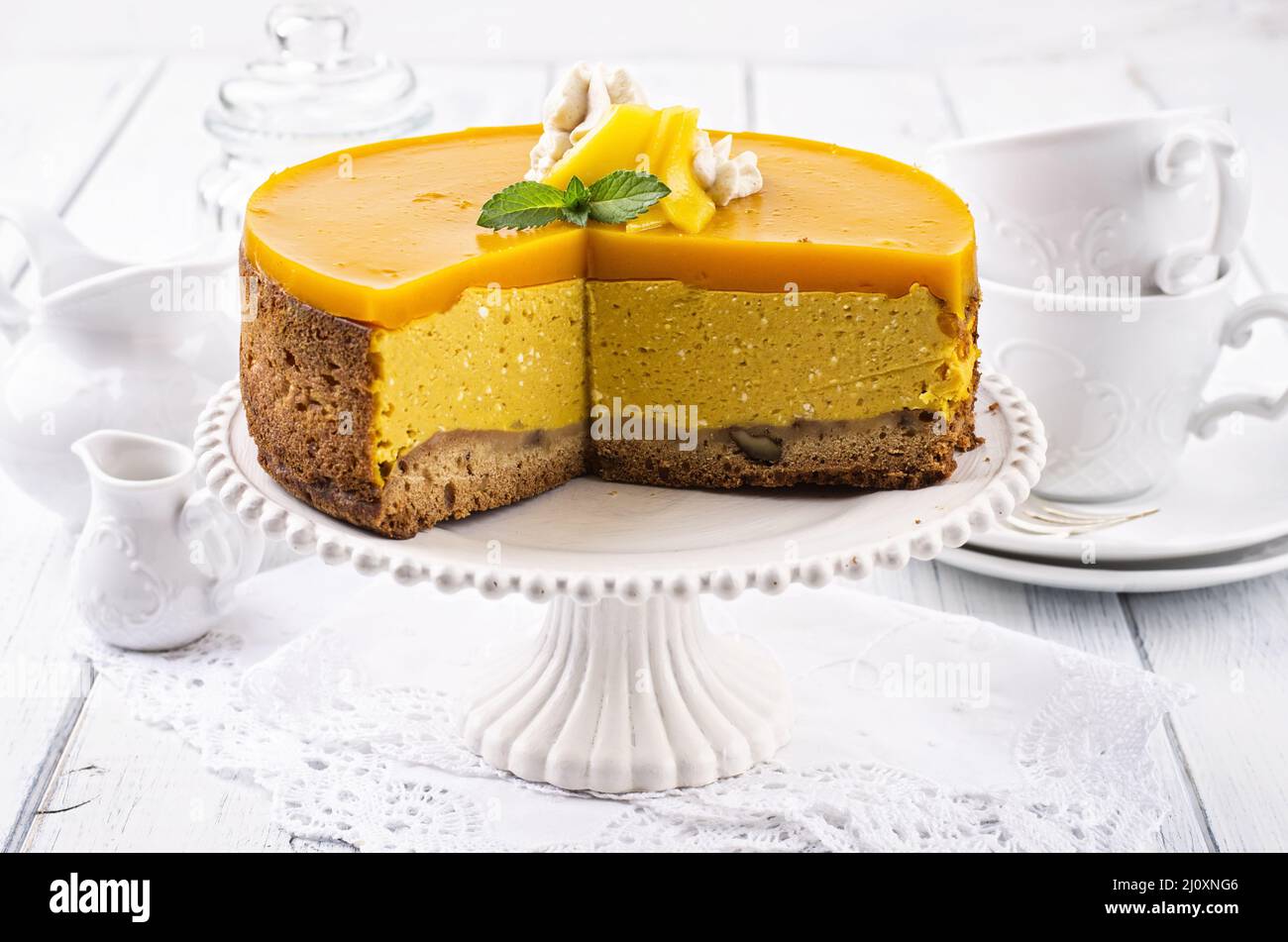 Cheesecake with mango Stock Photo - Alamy