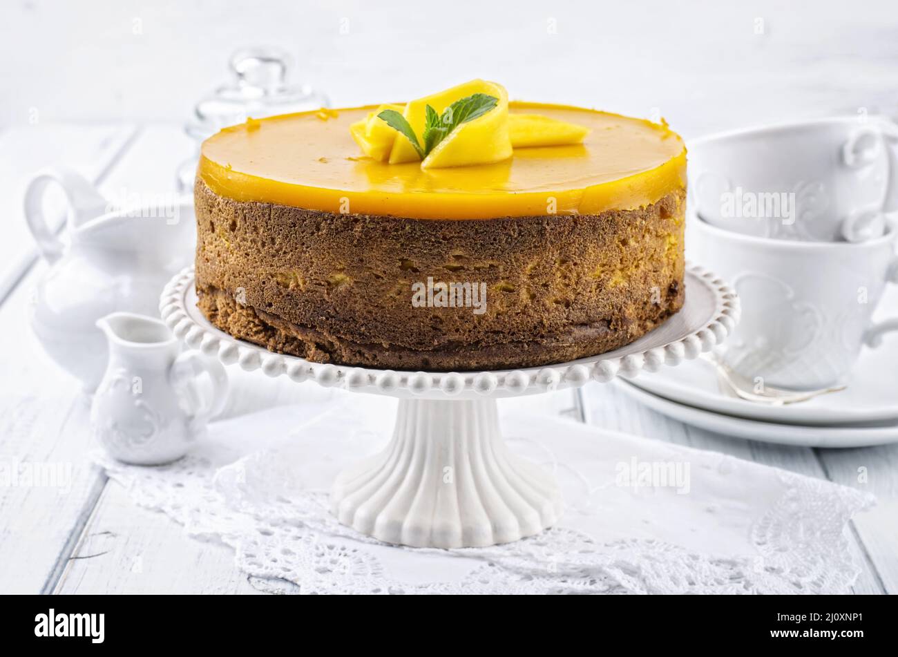 Cheesecake with mango Stock Photo - Alamy