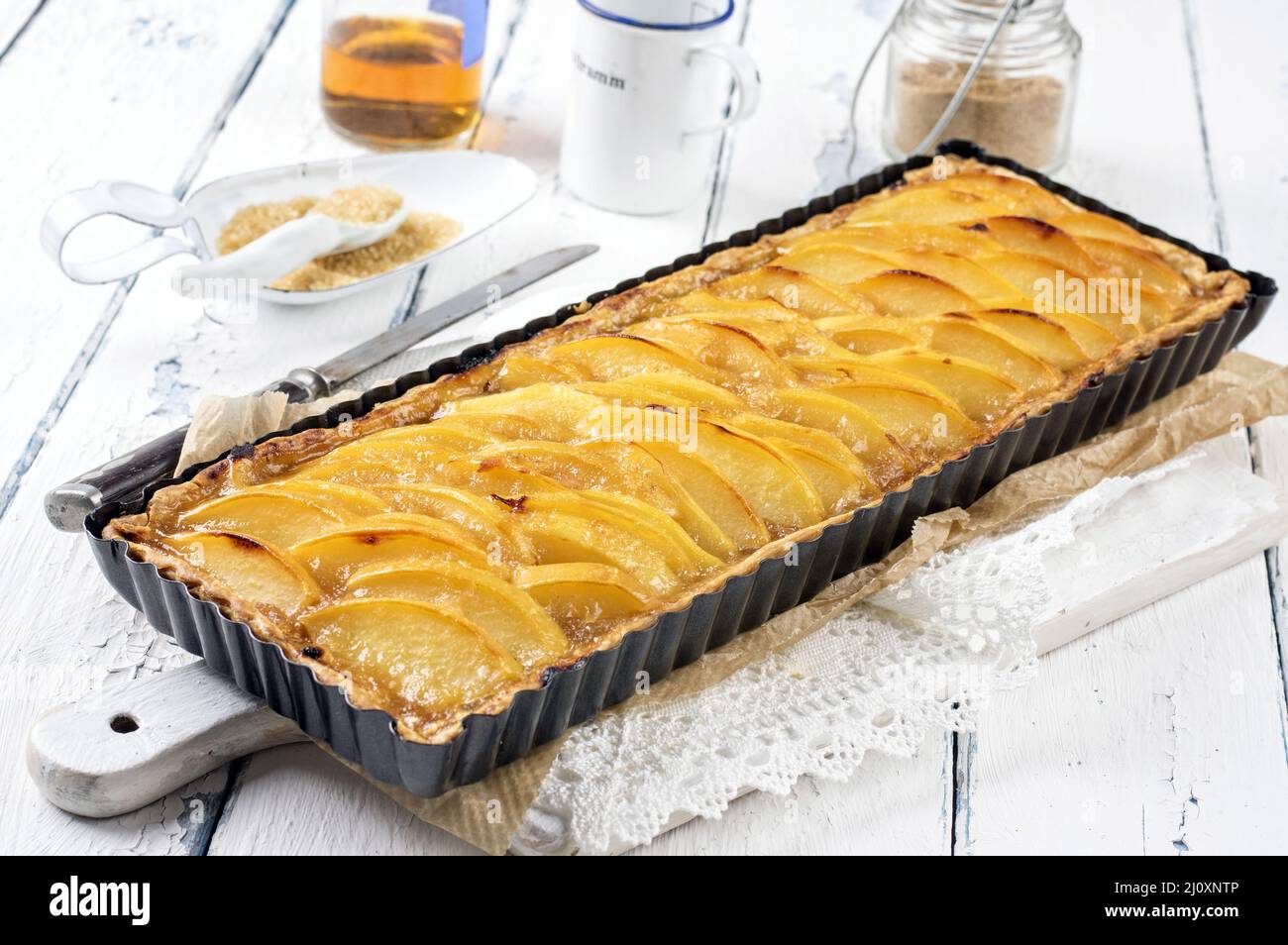Traditional French quince tart served as close-up in classic backing ...
