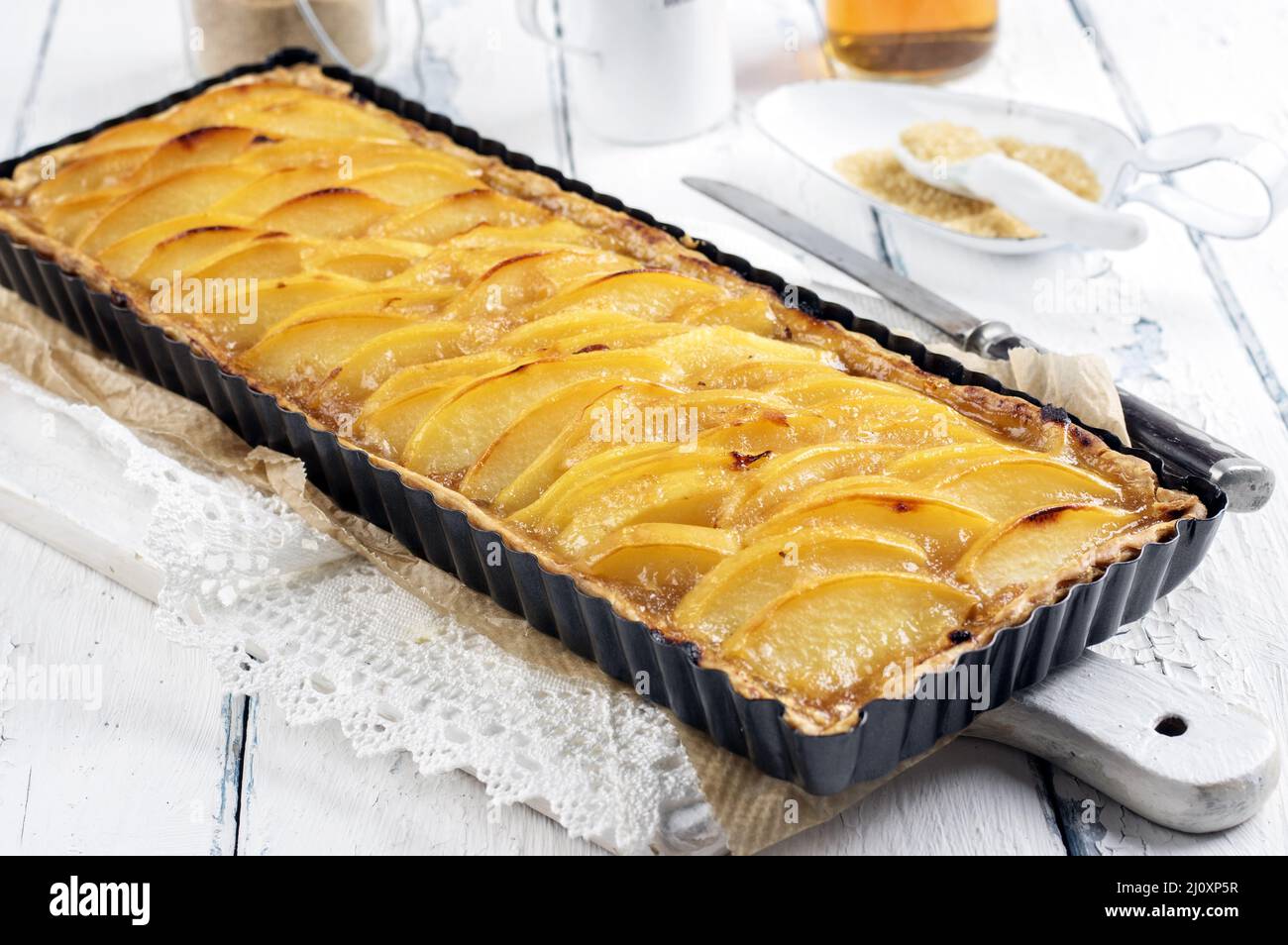 Traditional French quince tart served as close-up in classic backing ...